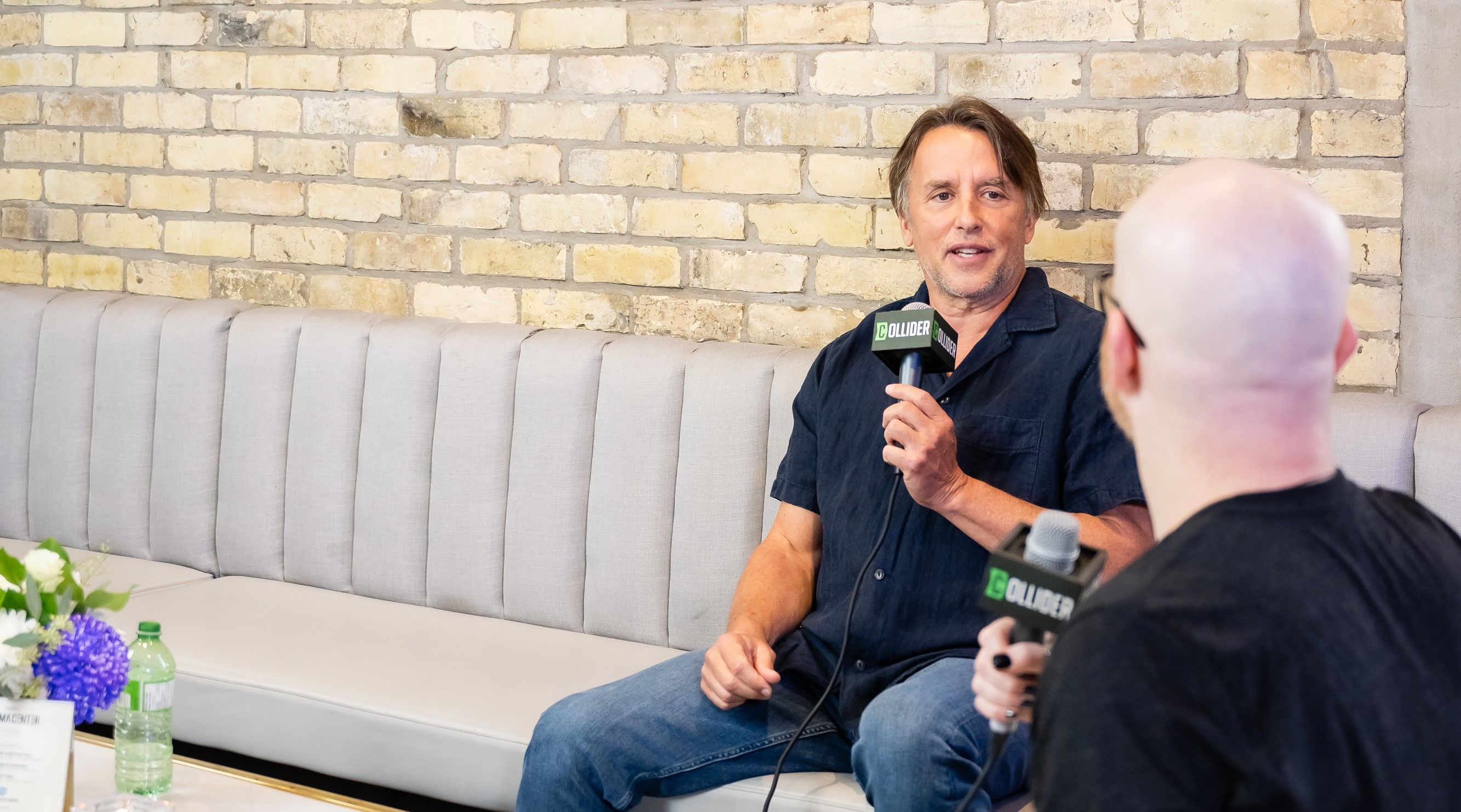 Richard Linklater on ‘Hit Man' & Glen Powell’s Chemistry with Adria Arjona